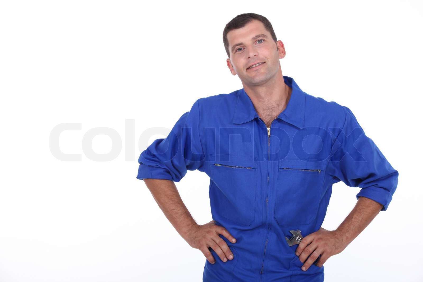 Man in blue overalls | Stock image | Colourbox