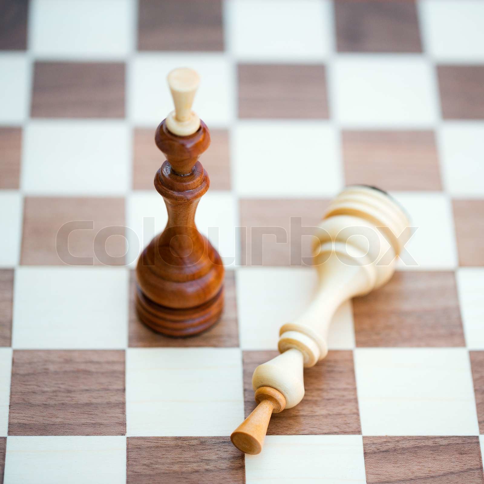 Two chess pieces alone on a chess board | Stock image | Colourbox