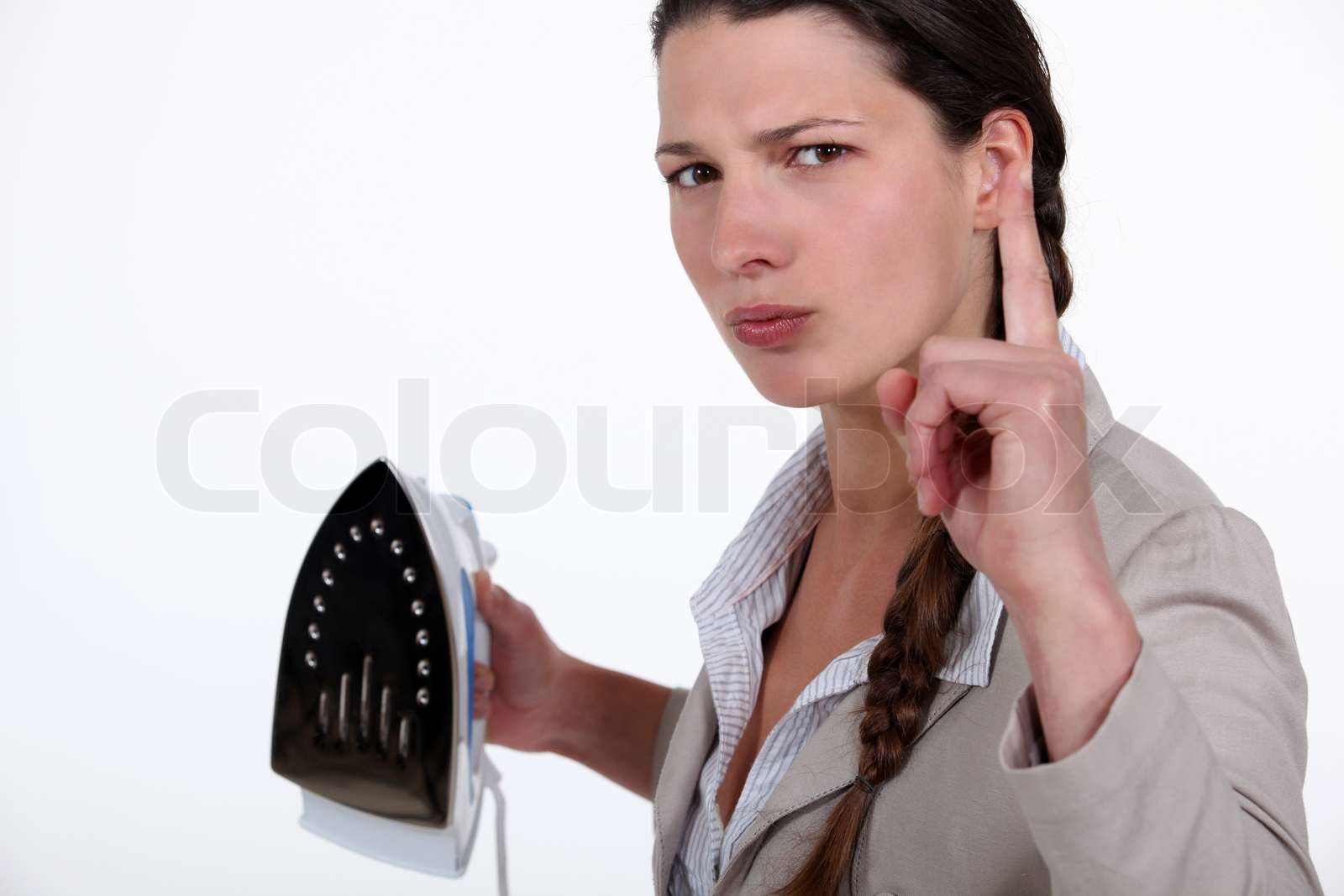 Woman shaking her finger in disapproval | Stock image | Colourbox