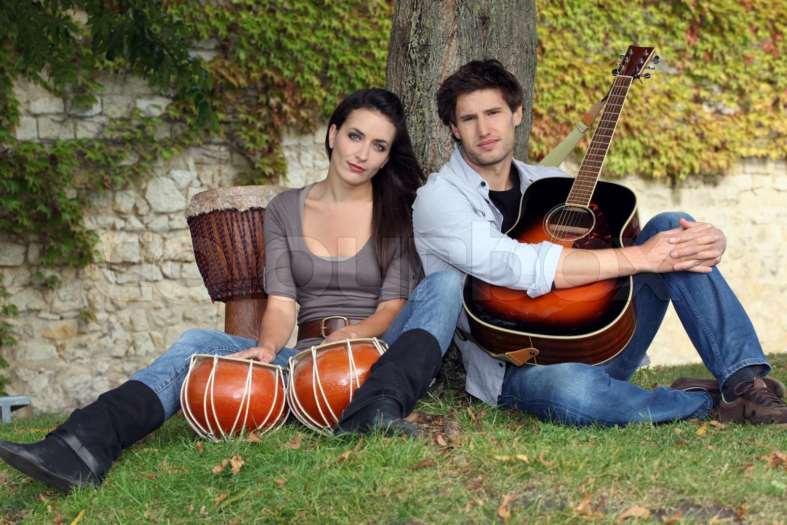 Musical couple in filed | Stock image | Colourbox