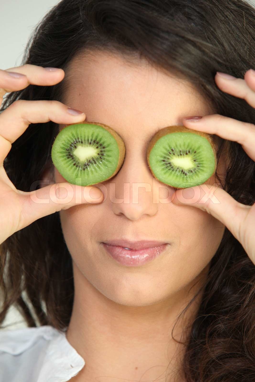 Woman with kiwi eyes | Stock image | Colourbox Woman with kiwi eyes | Stock image | Colourbox