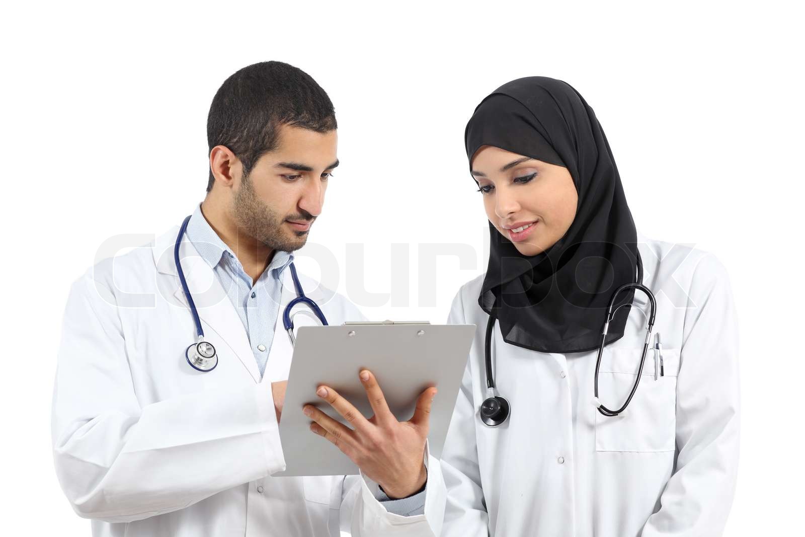 Saudi arab doctors diagnosing looking a medical history | Stock image ...