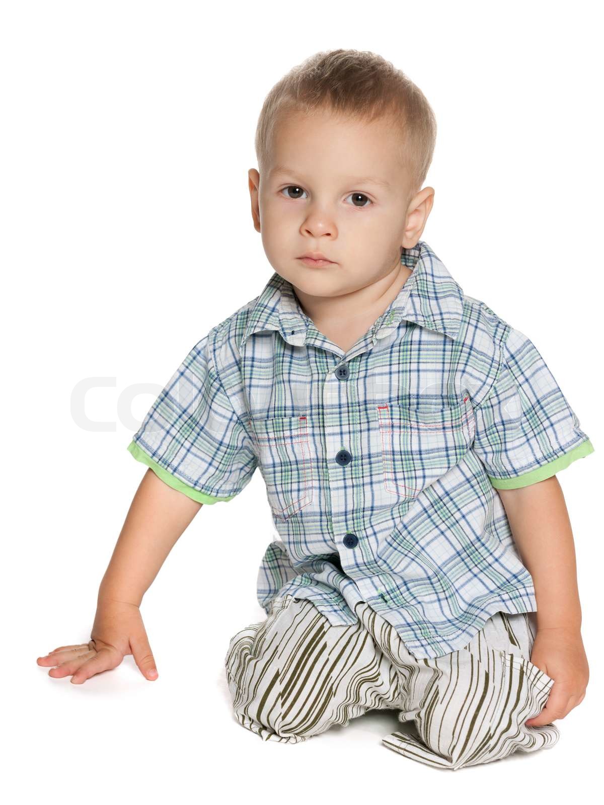 Serious little boy | Stock image | Colourbox