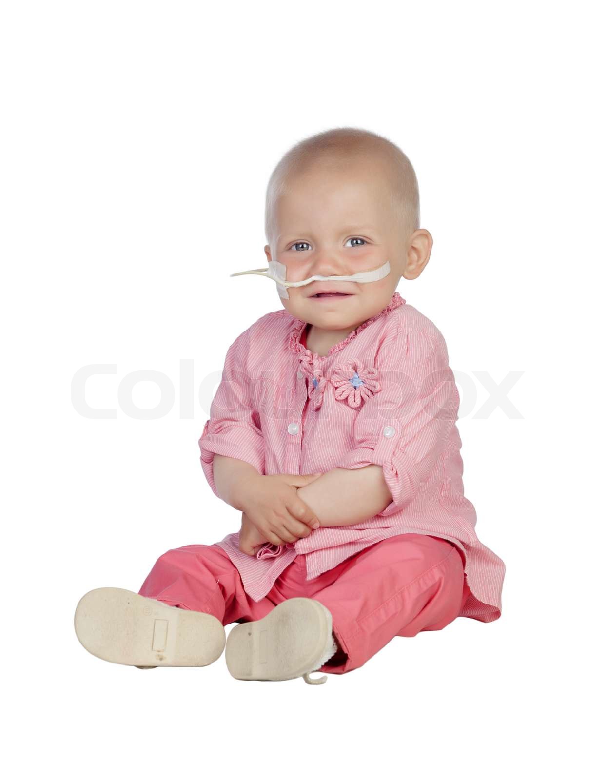 Adorable baby without hair beating the disease | Stock image | Colourbox