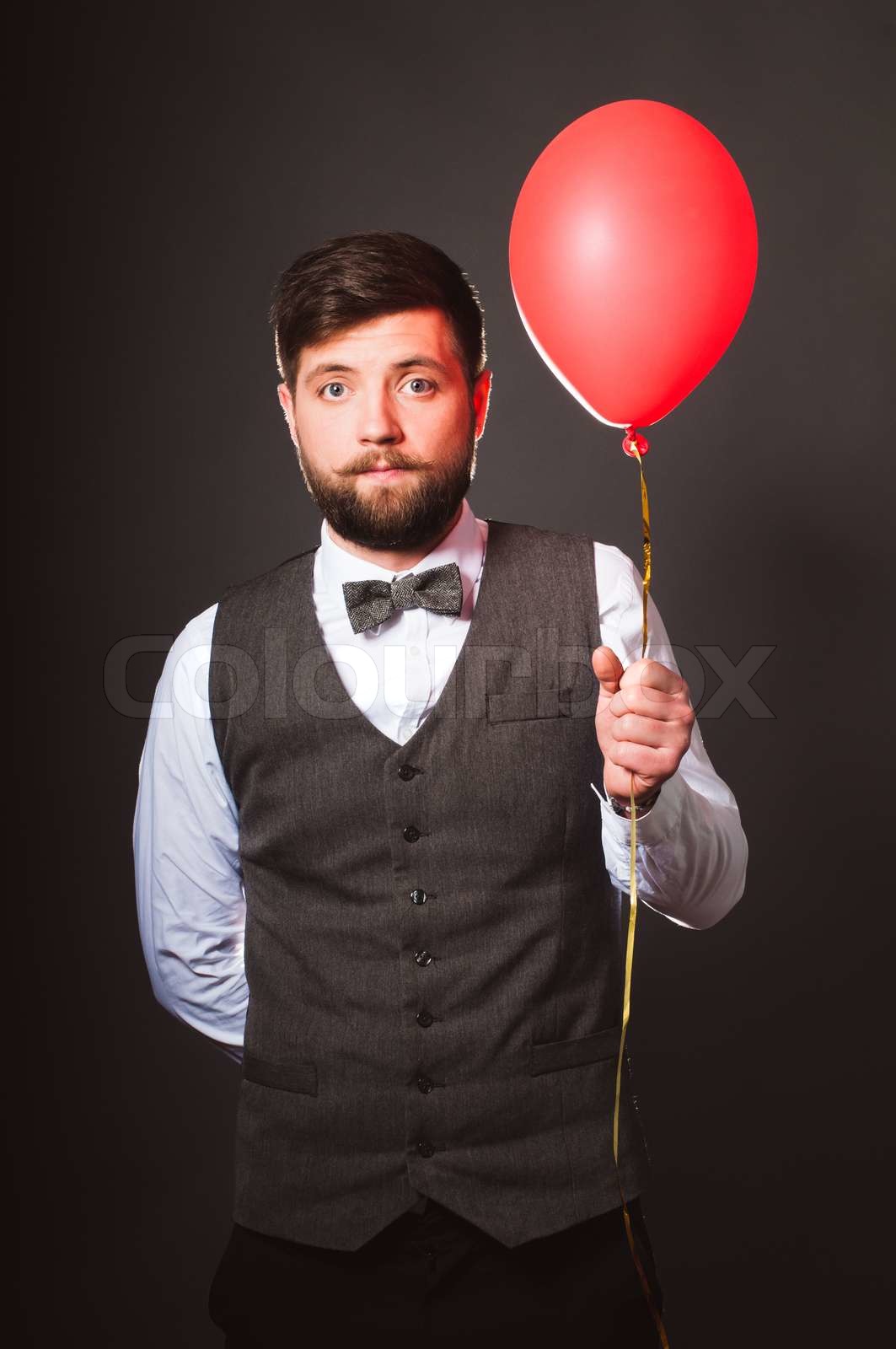 Man with balloon | Stock image | Colourbox