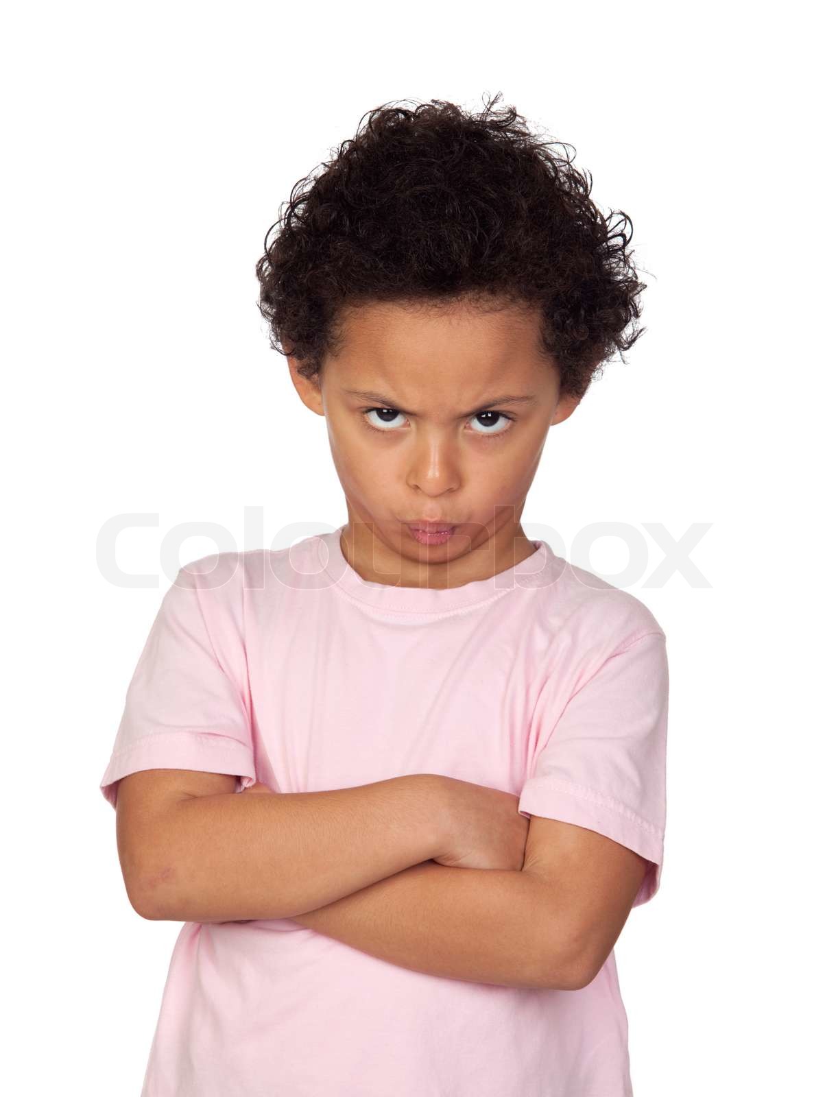 Angry latin child | Stock image | Colourbox