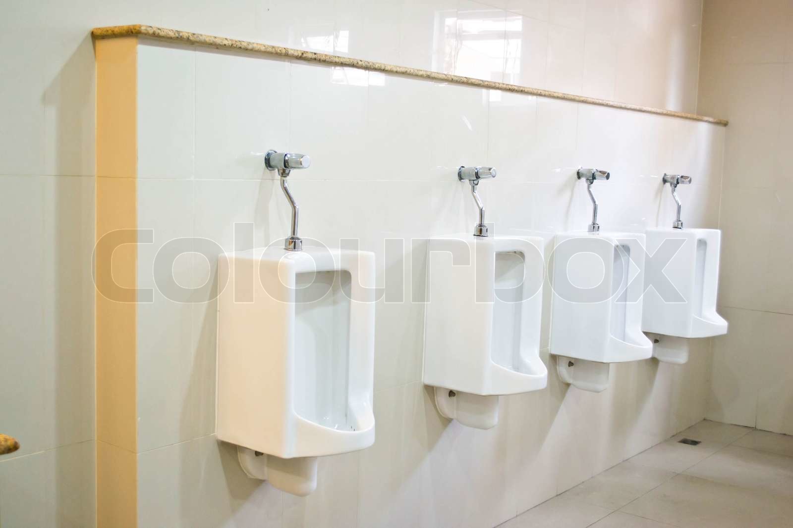 Urinal in the bathroom at the hotel | Stock image | Colourbox