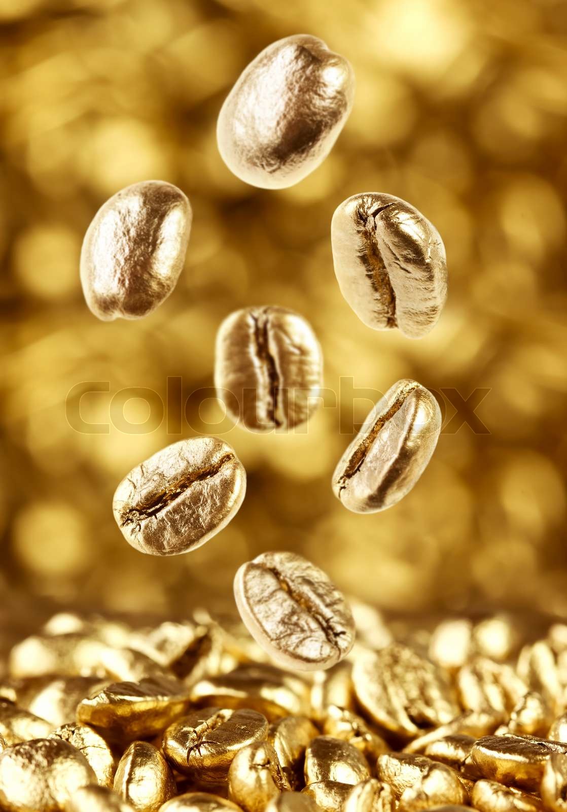 Gold coffee beans | Stock image | Colourbox