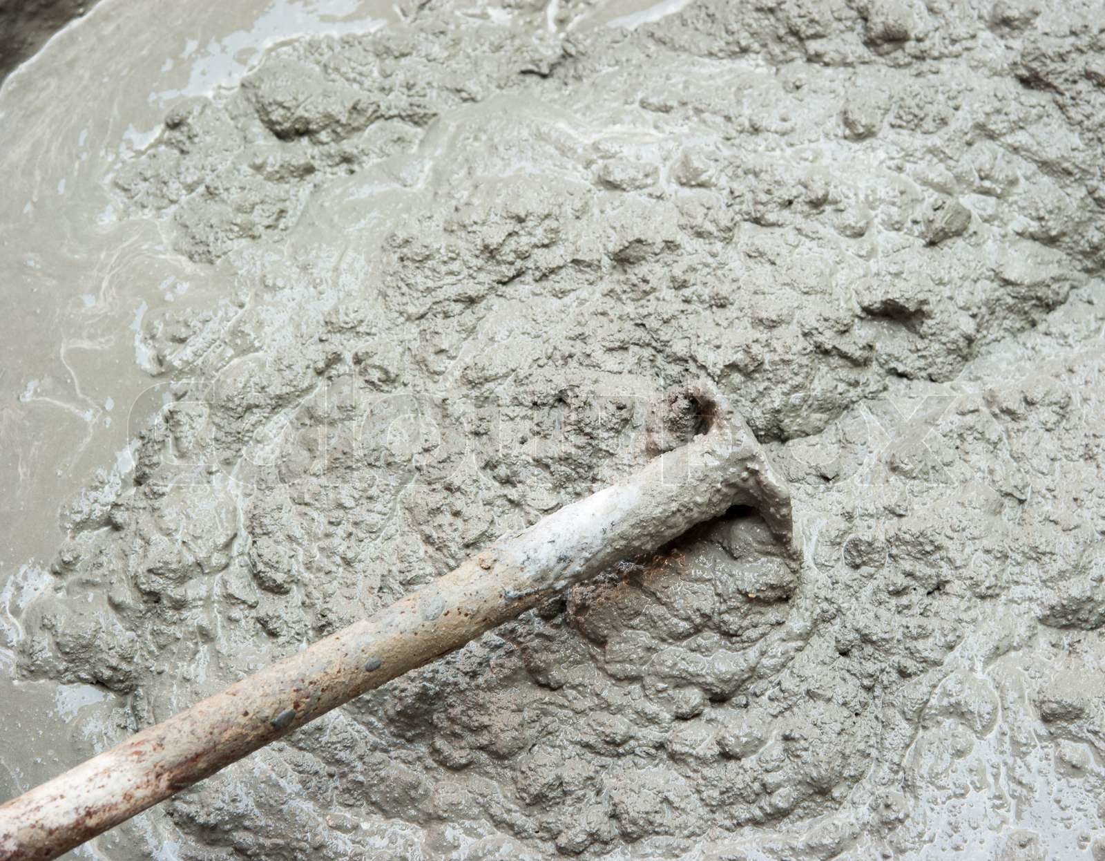 spade and wet cement image for construction process | Stock image ...