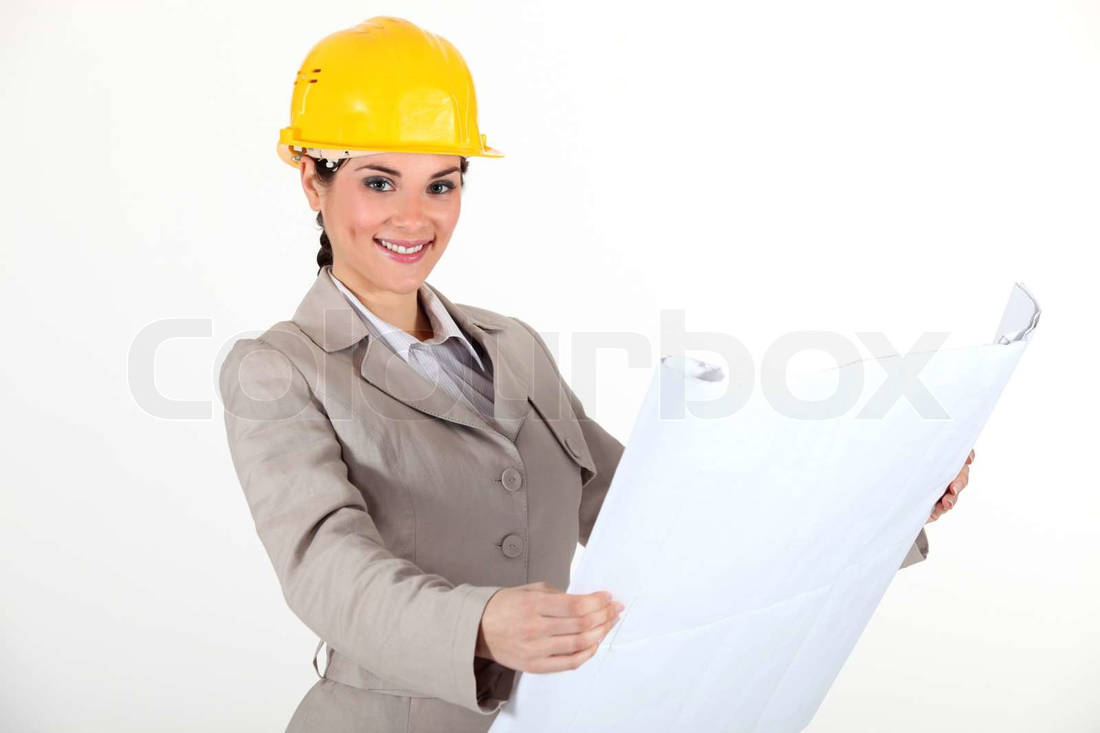 Engineer with a technical drawing | Stock image | Colourbox