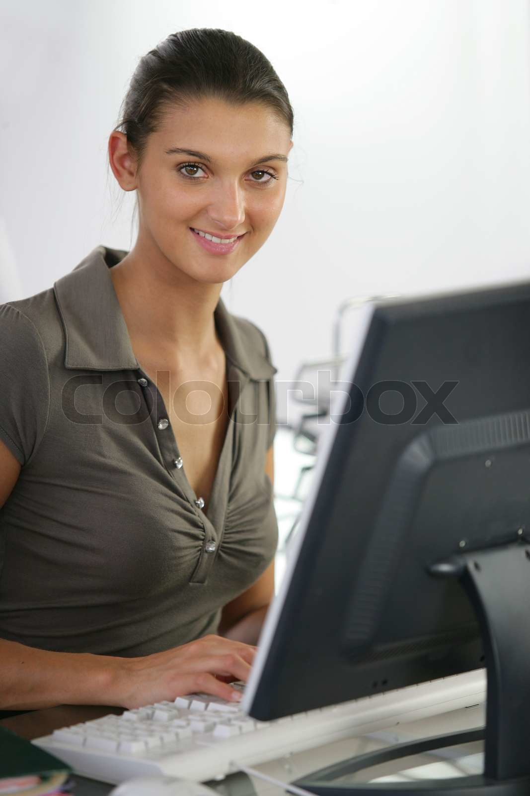 Young female receptionist | Stock image | Colourbox