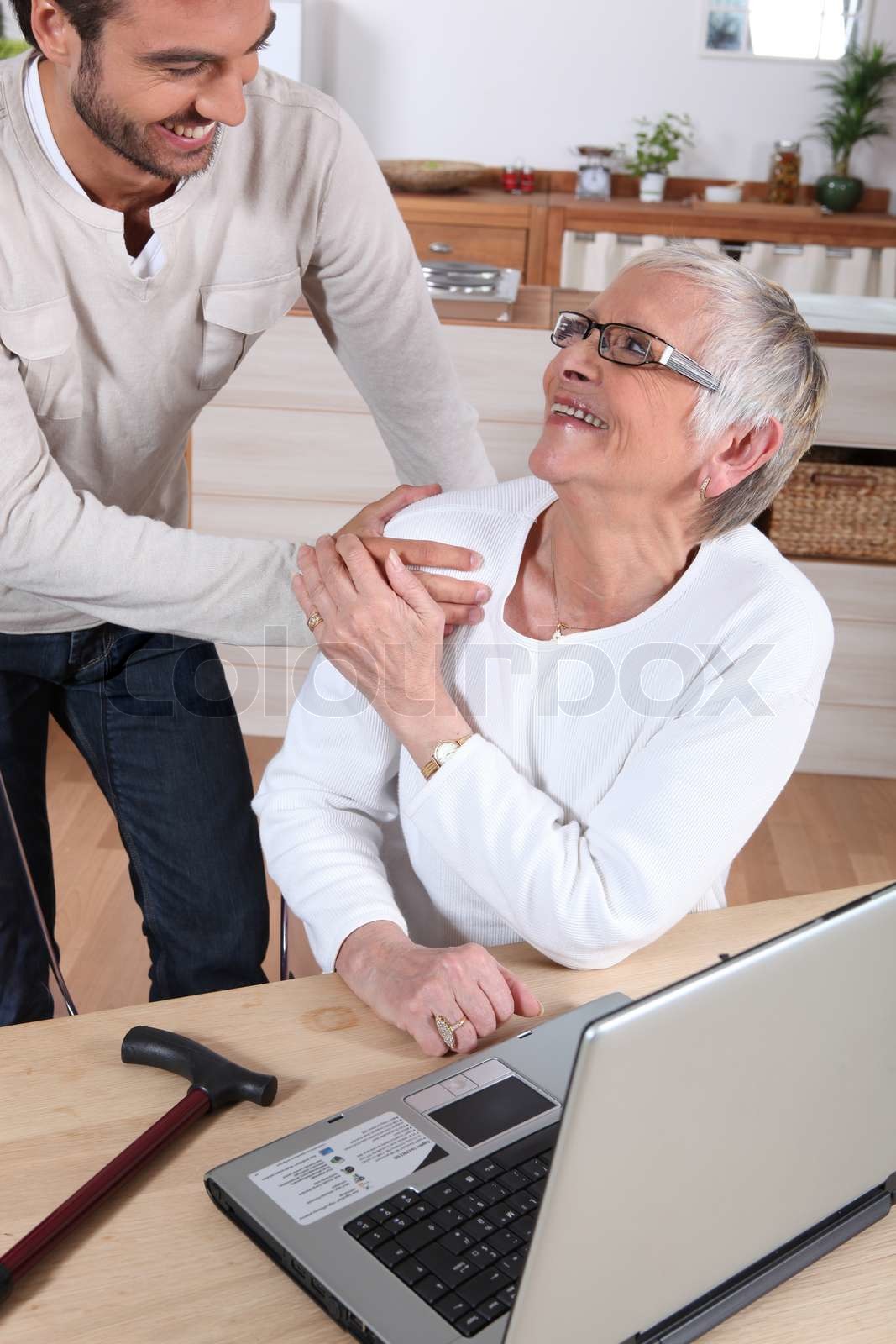 Helping old lady | Stock image | Colourbox