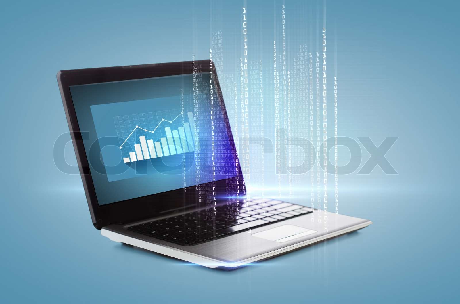 laptop computer with graph on desktop | Stock image | Colourbox