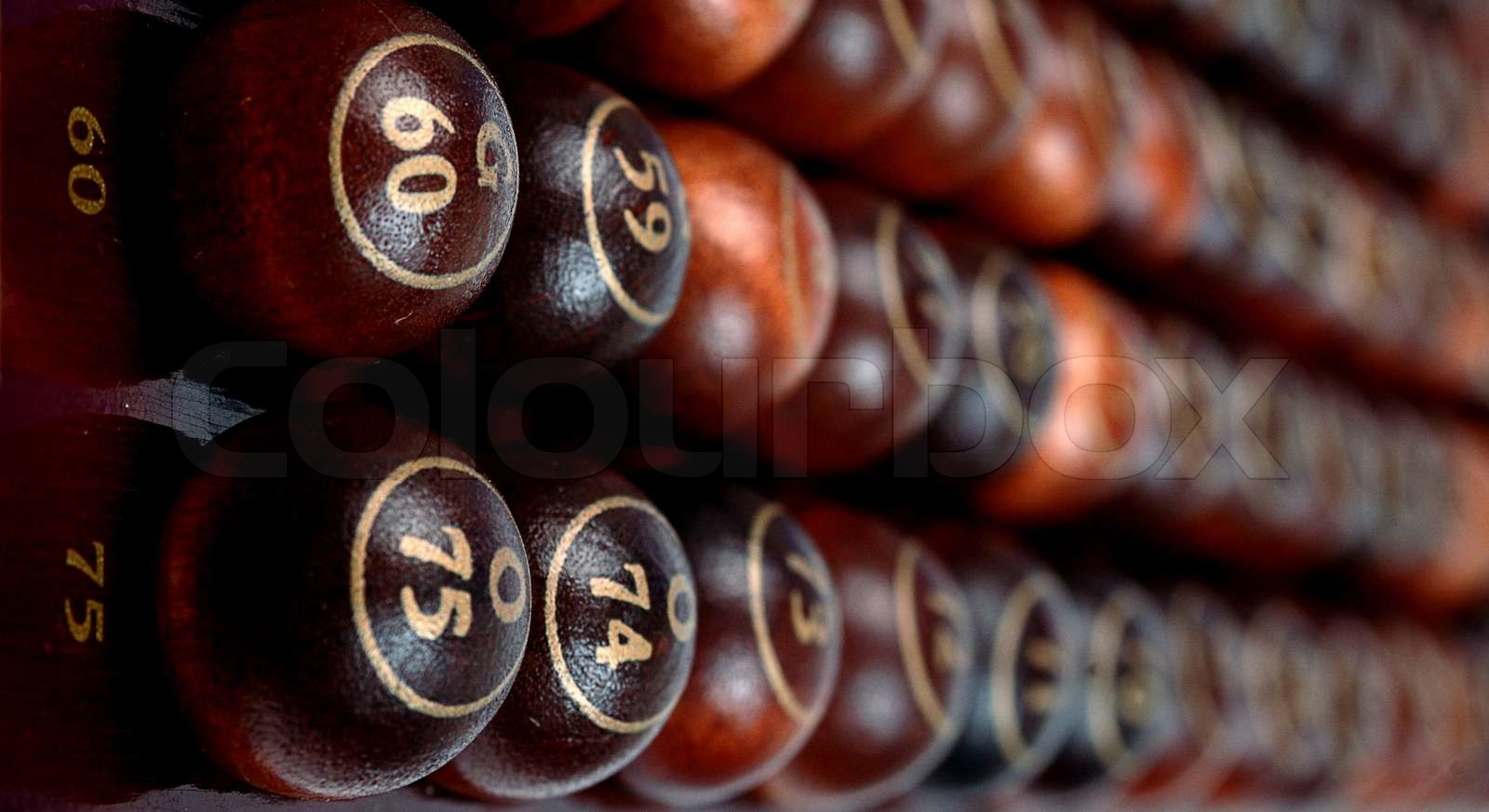 wooden bingo balls in a row | Stock image | Colourbox