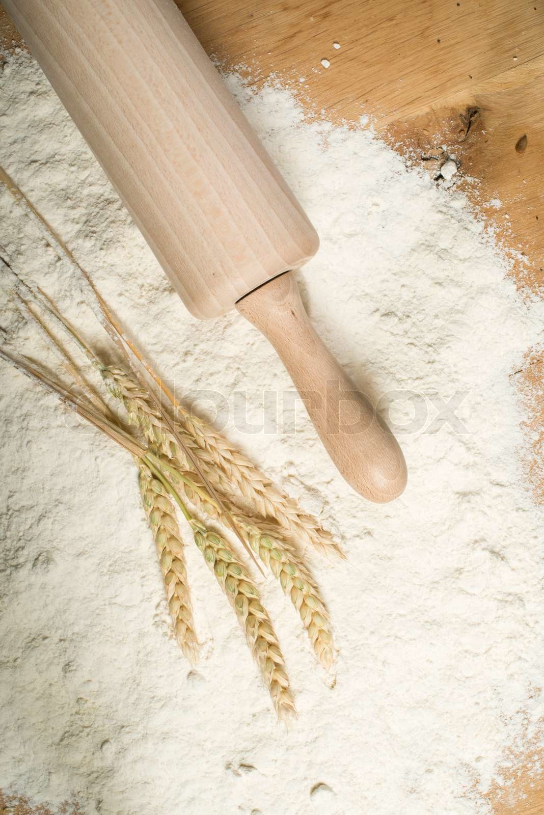 Pile of flour, rolling pin and wheat | Stock image | Colourbox