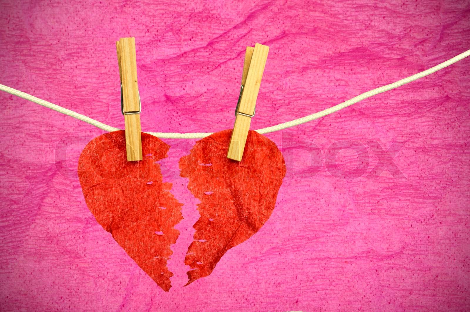 Paper Heart divided into two parts | Stock image | Colourbox