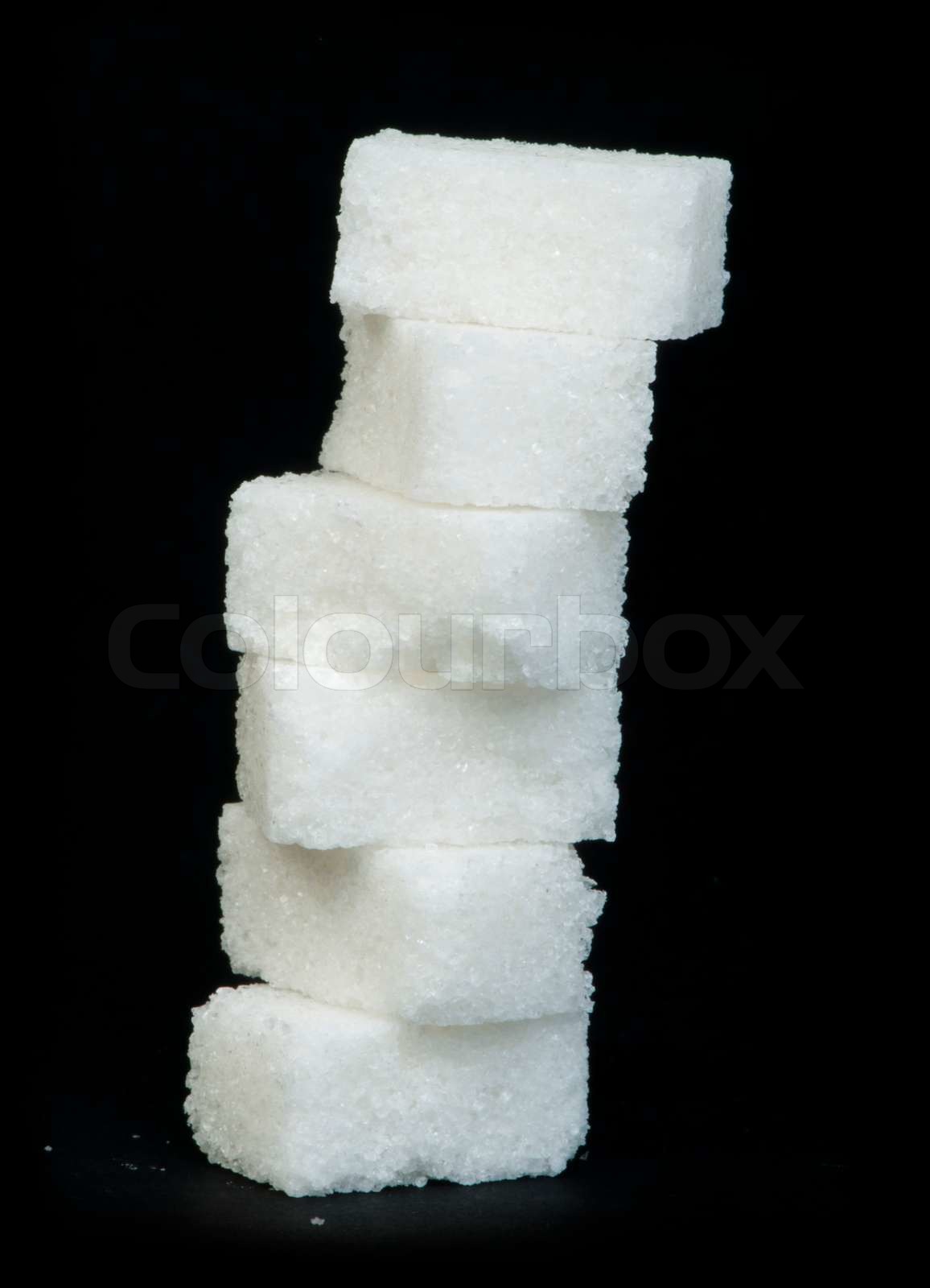Sugar lumps black isolated | Stock image | Colourbox