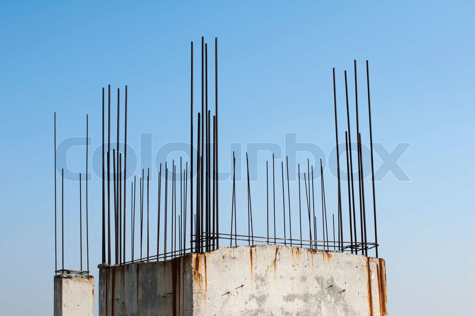 Old reinforcing steel protruding from the concrete | Stock image ...