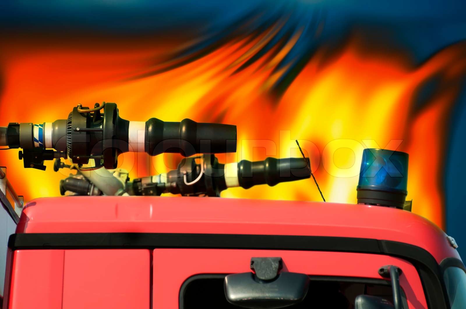 Fire truck and flames | Stock image | Colourbox