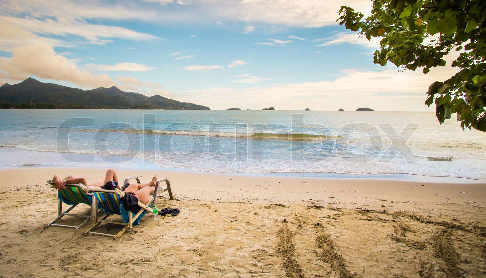 People are relaxing on the beach | Stock image | Colourbox
