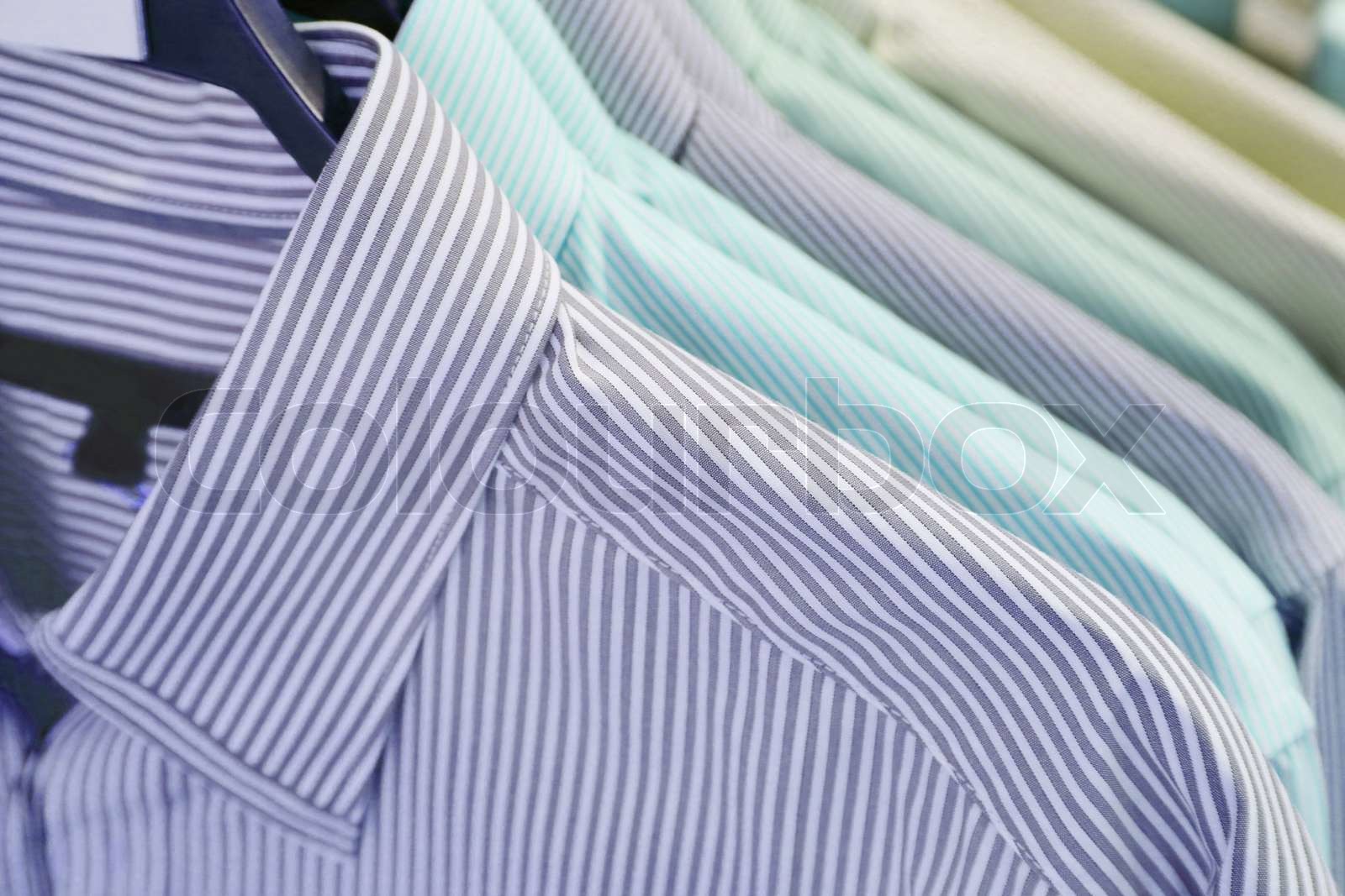 shirts hanging on a hanger | Stock image | Colourbox