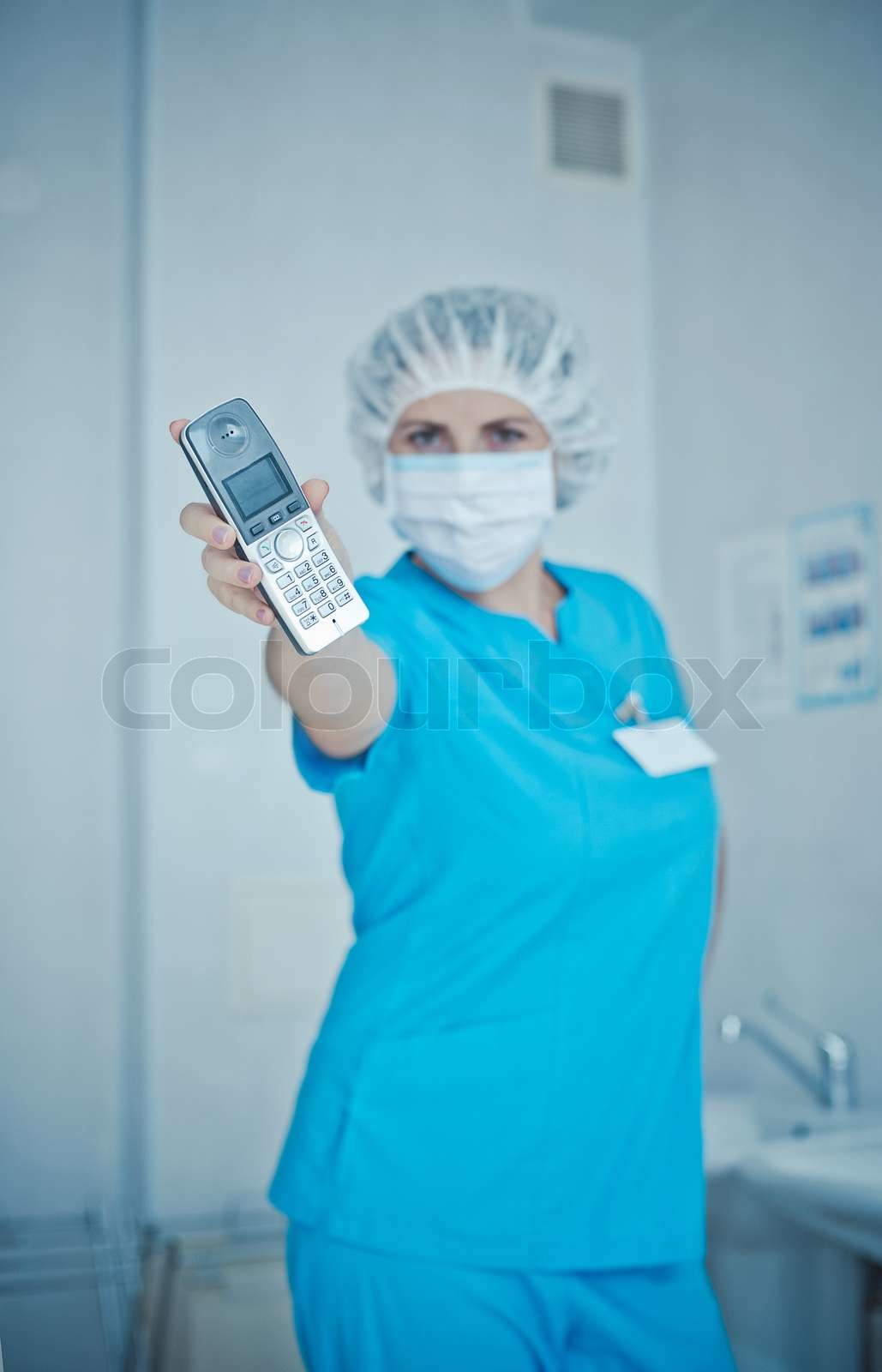 Nurse on the phone. | Stock image | Colourbox