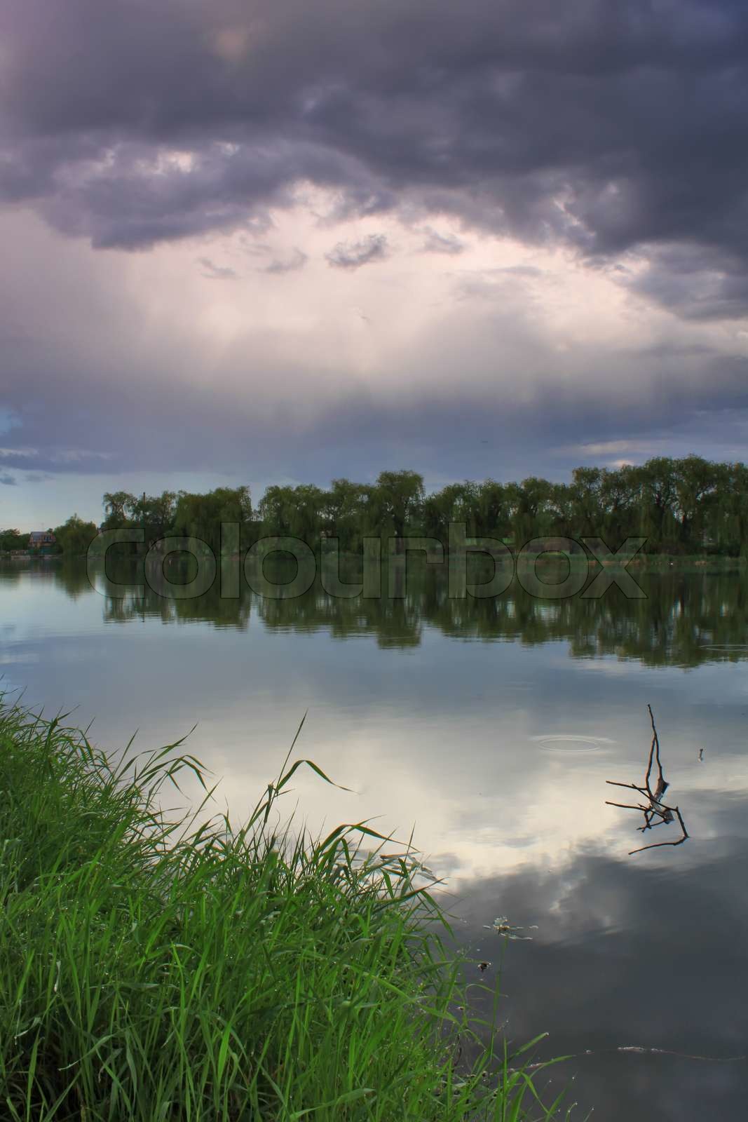 Rain over the lake | Stock image | Colourbox