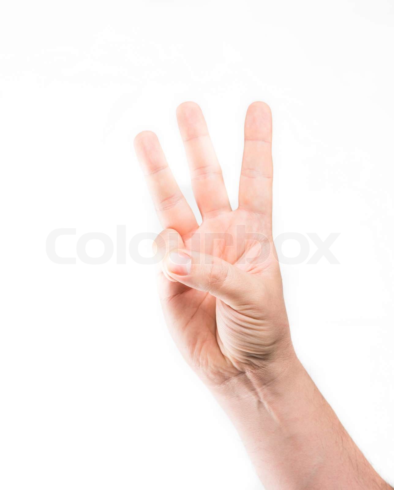 hand is showing three fingers | Stock image | Colourbox