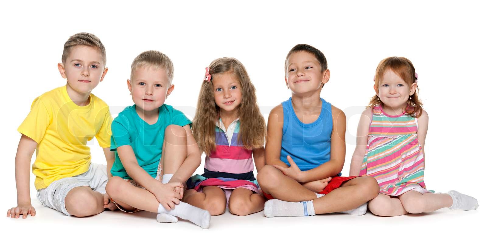 Sitting five cheerful children | Stock image | Colourbox