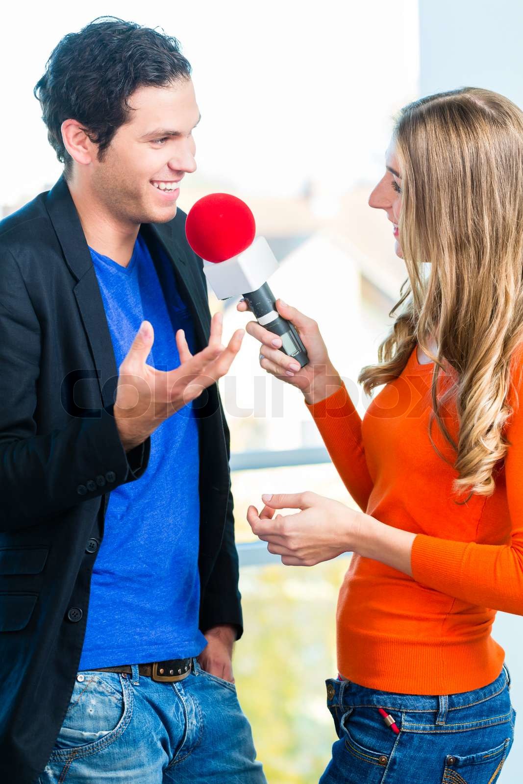 Radio host in radio stations with interview | Stock image | Colourbox