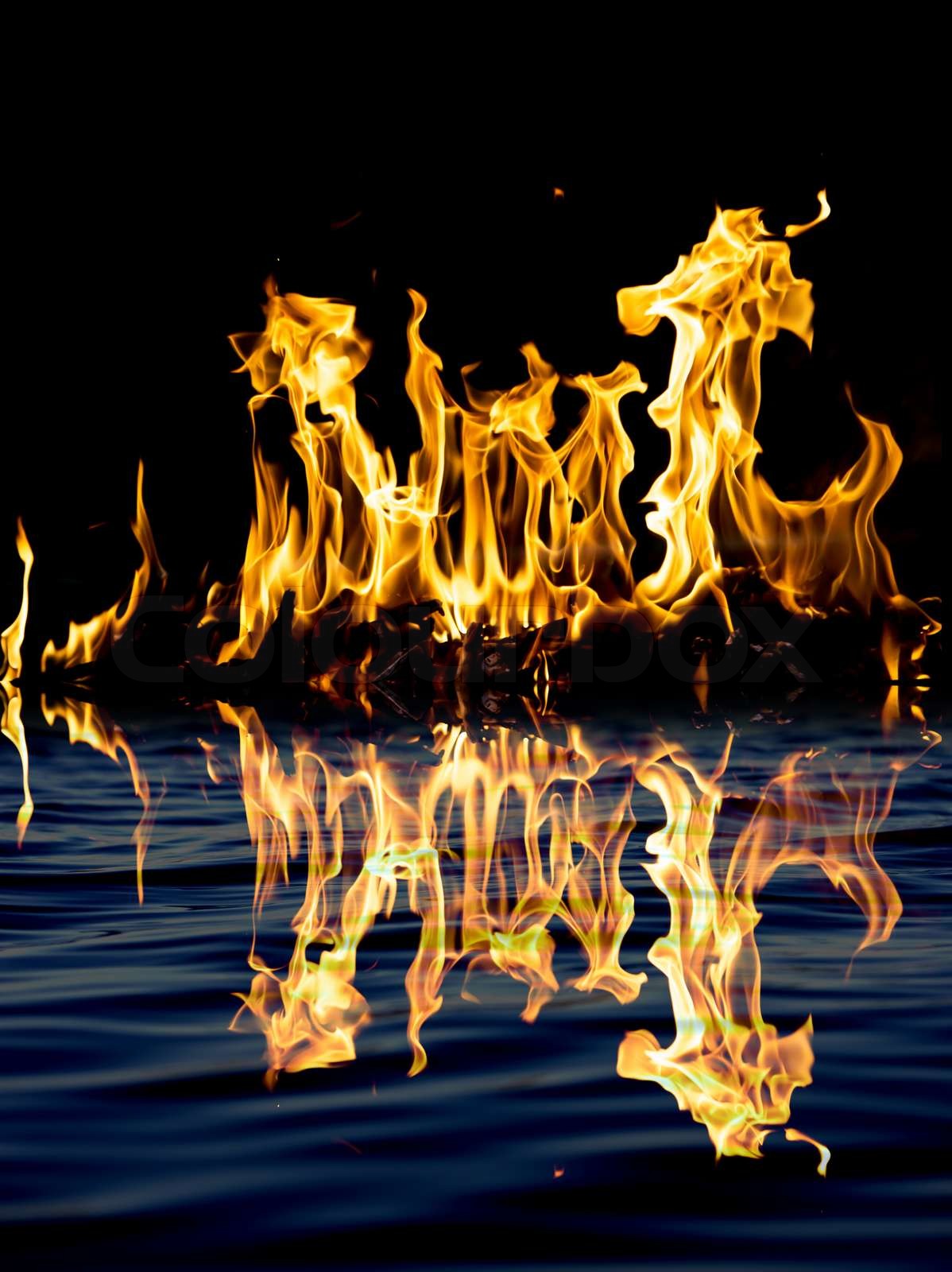 fire with reflection on water | Stock image | Colourbox