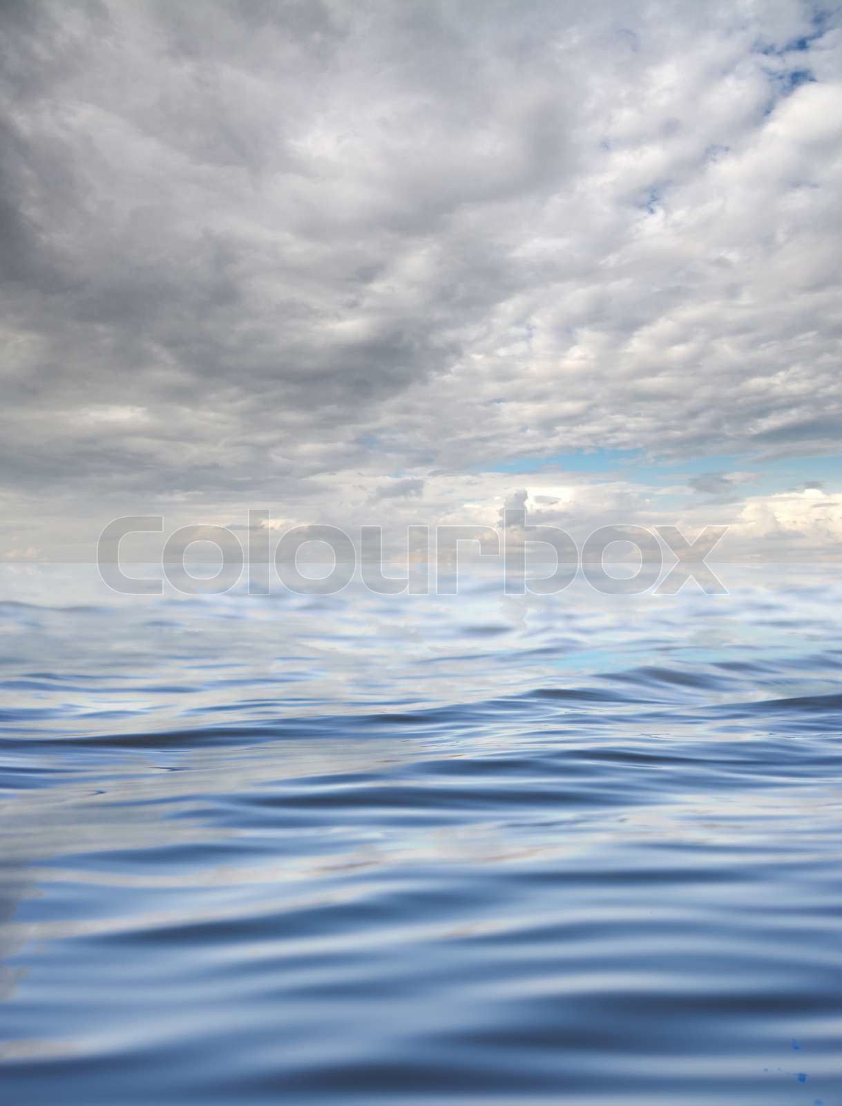 clouds with reflection on water | Stock image | Colourbox