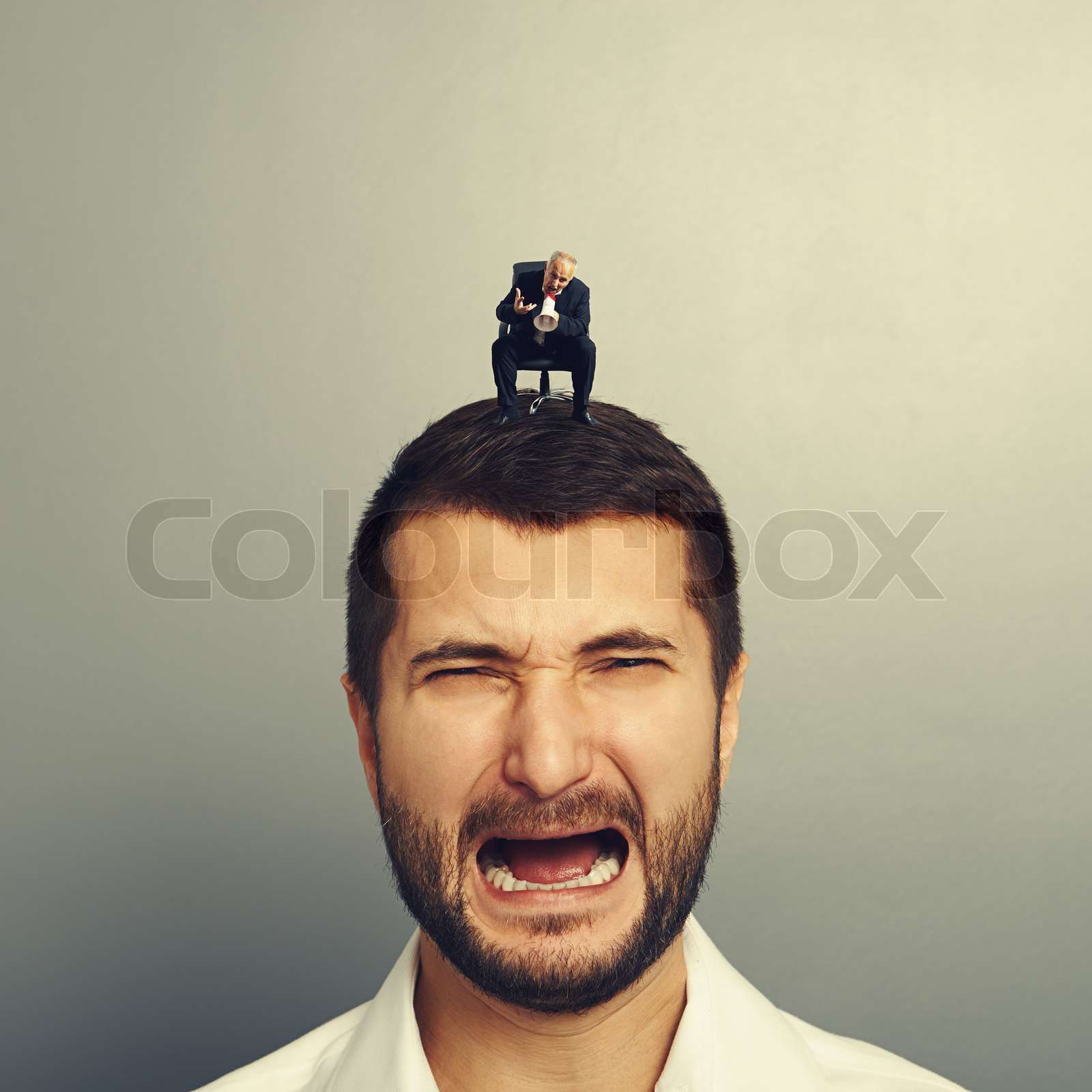 angry boss screaming at crying man | Stock image | Colourbox