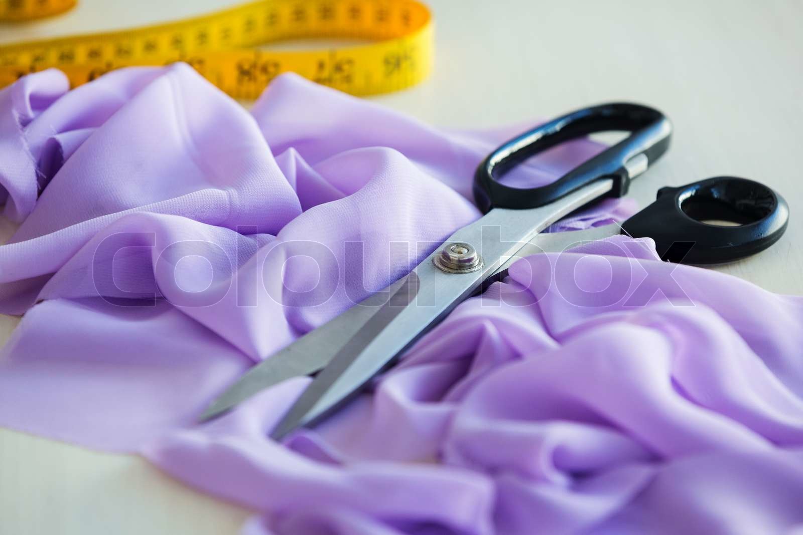 Scissors And A Fabric Stock Image Colourbox scissors-and-a-fabric-stock-image-colourbox