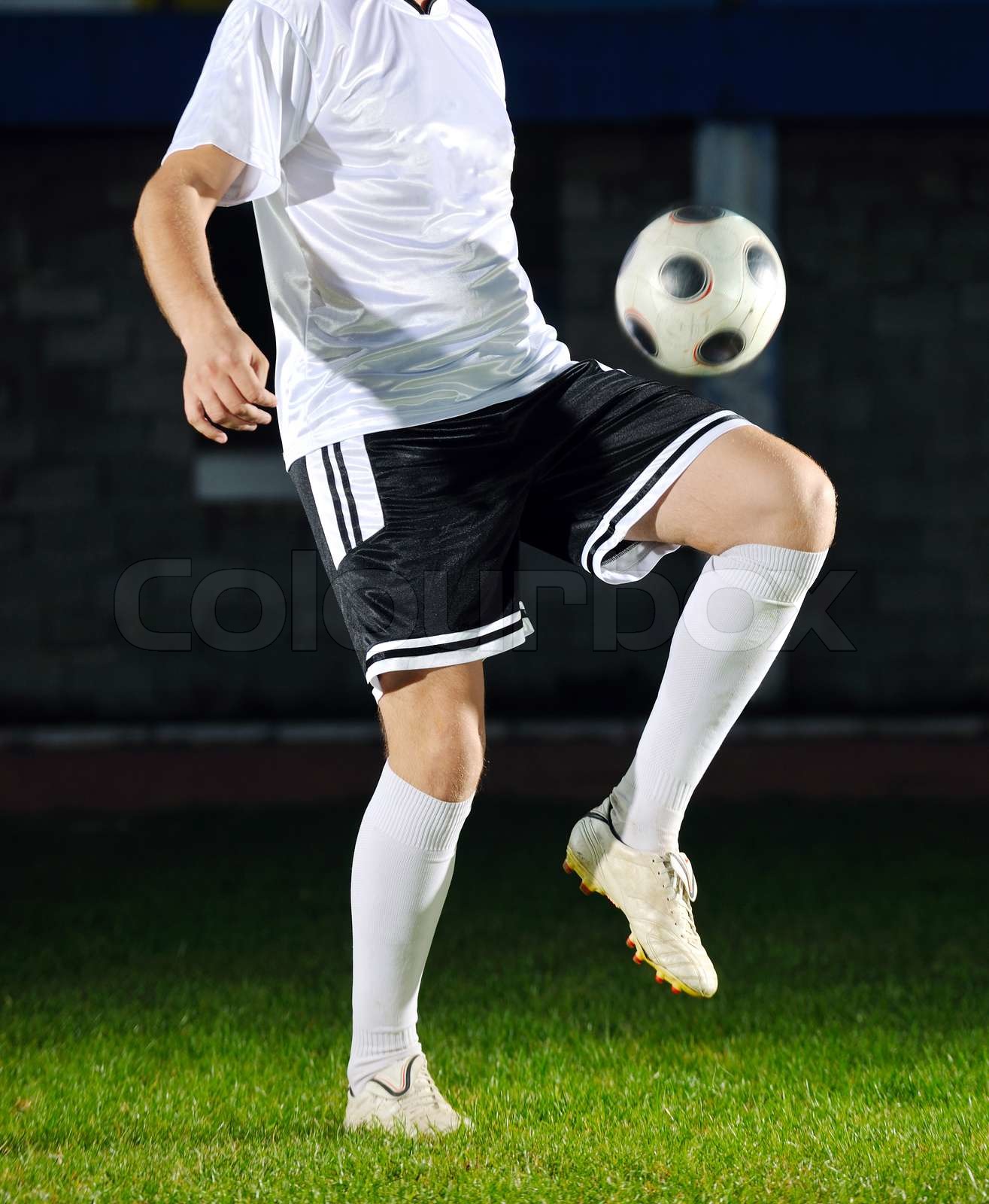 football player in action | Stock image | Colourbox