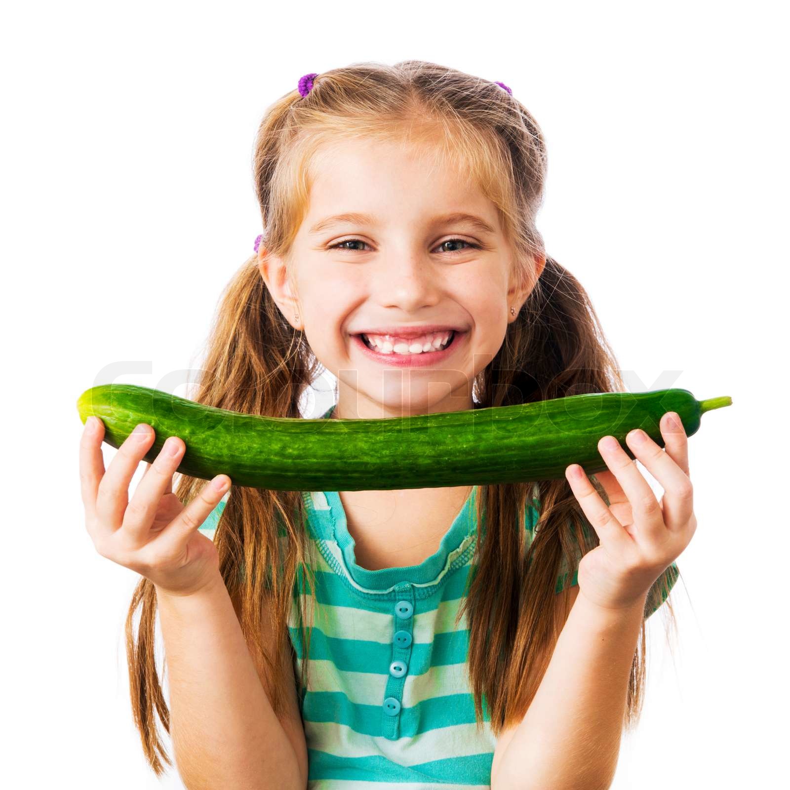 little girl with cucumber | Stock image | Colourbox