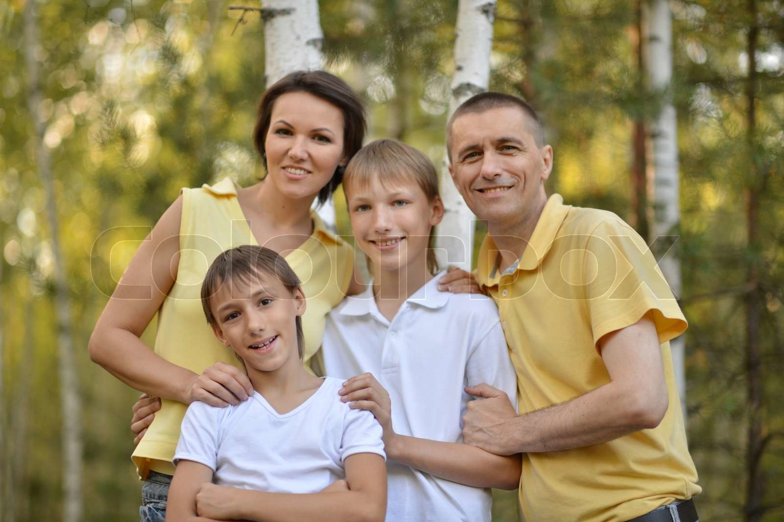 Family of four is having fun | Stock image | Colourbox