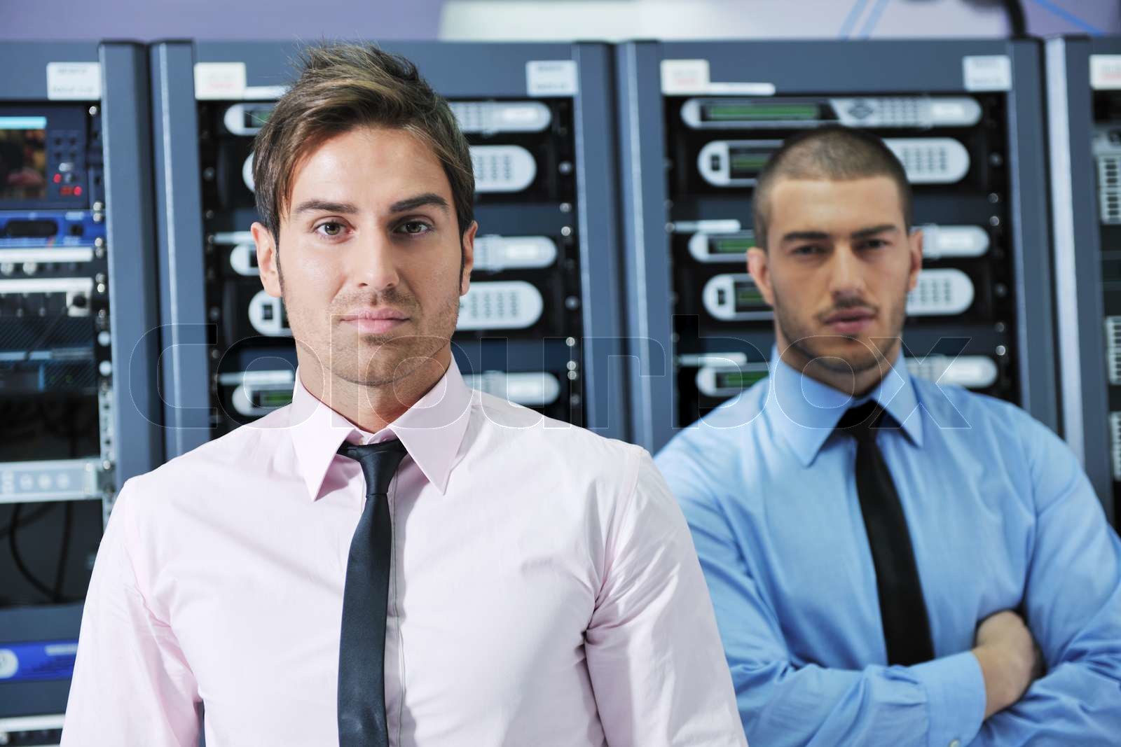 it engineers in network server room | Stock image | Colourbox