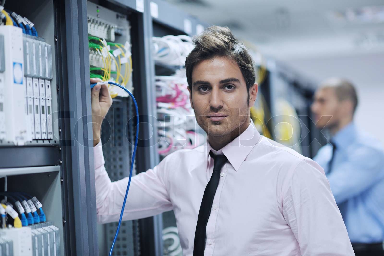it engineers in network server room | Stock image | Colourbox