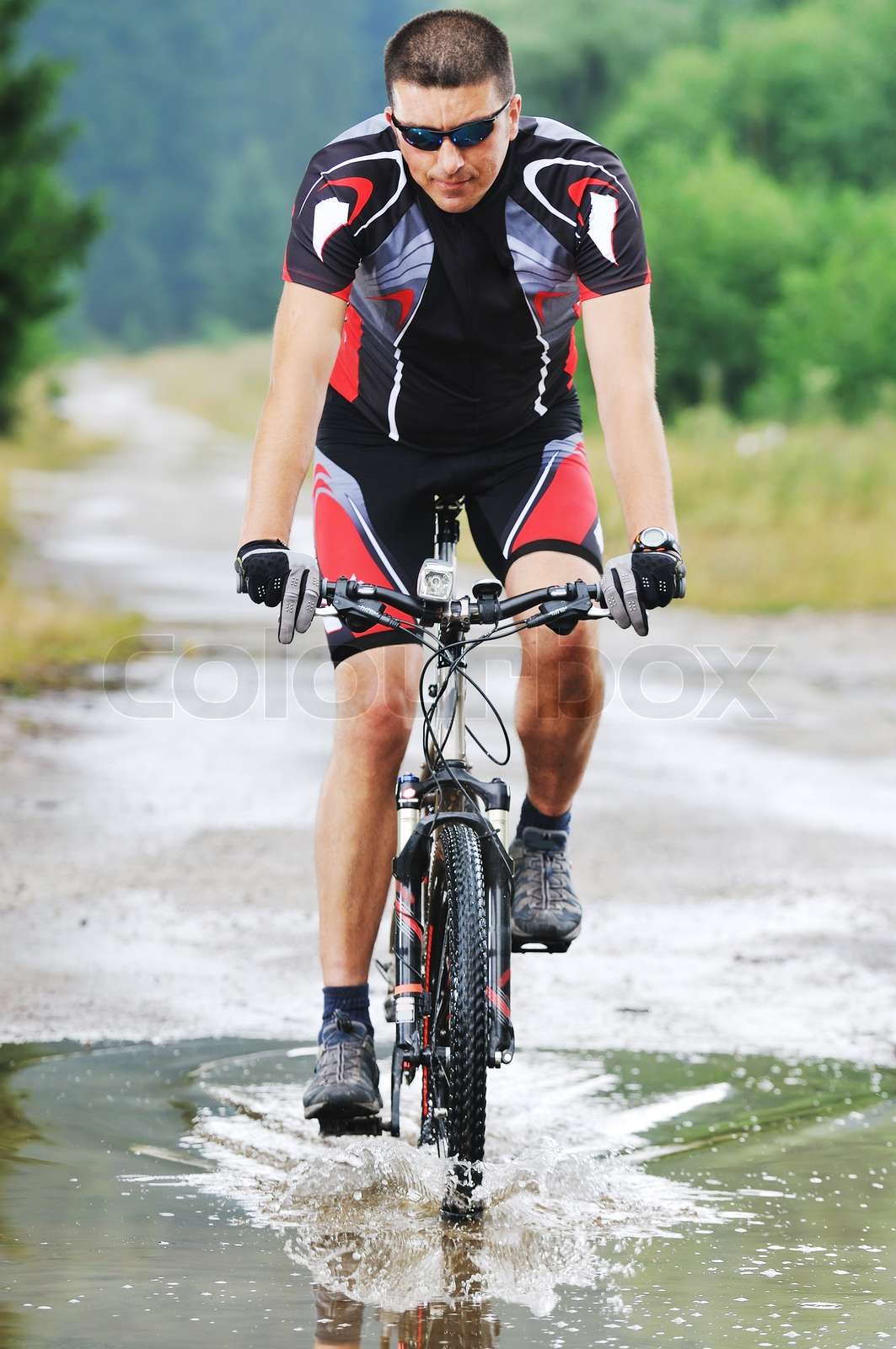 wet mount bike ride | Stock image | Colourbox