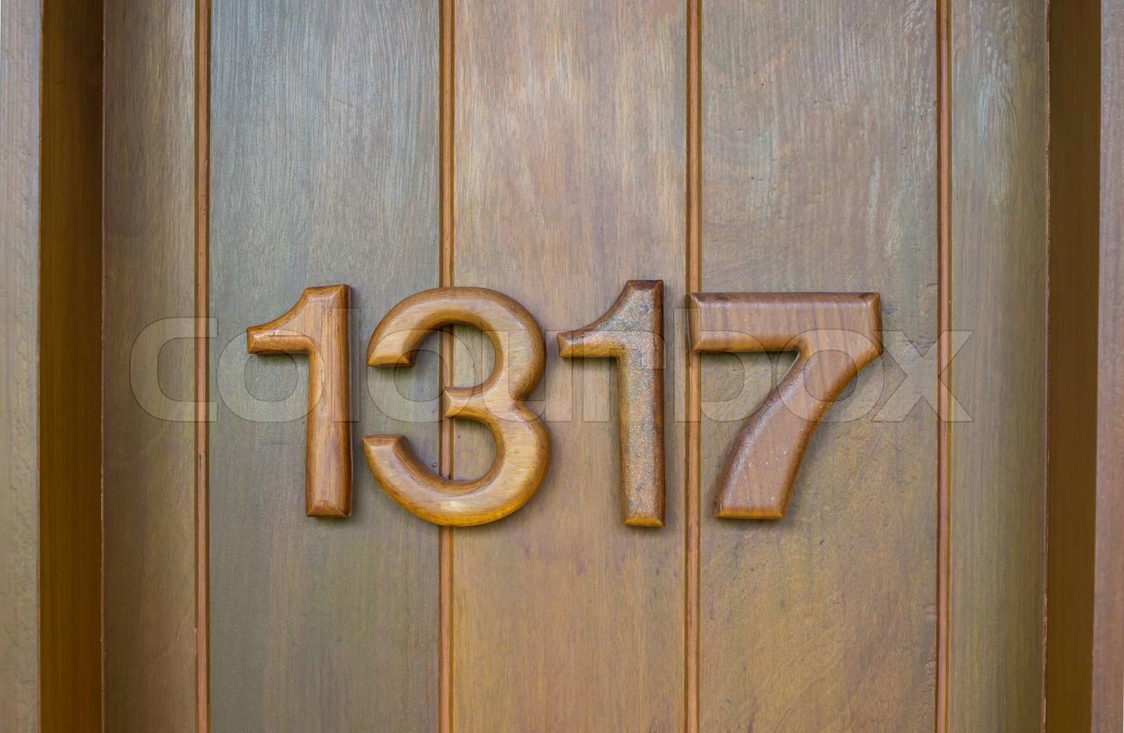 numbers of doors, room door, wooden door | Stock image | Colourbox