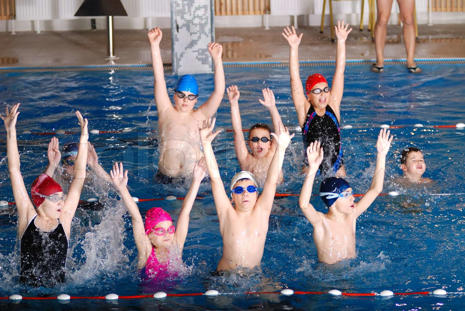 .childrens having fun in a swimming pool | Stock image | Colourbox