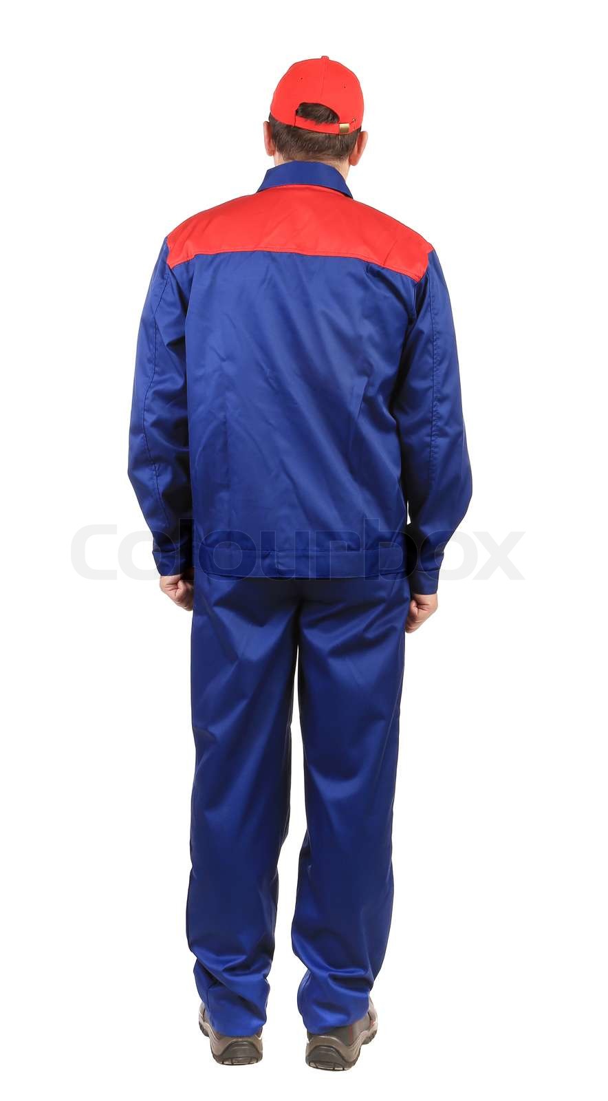 Man in blue and red overalls | Stock image | Colourbox