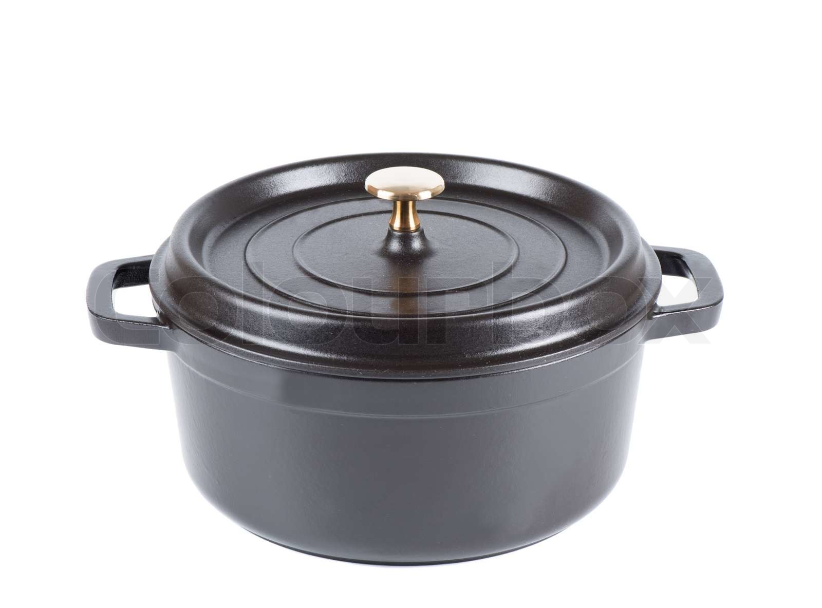 Iron cast pot with cover and brass knob isolated | Stock image | Colourbox