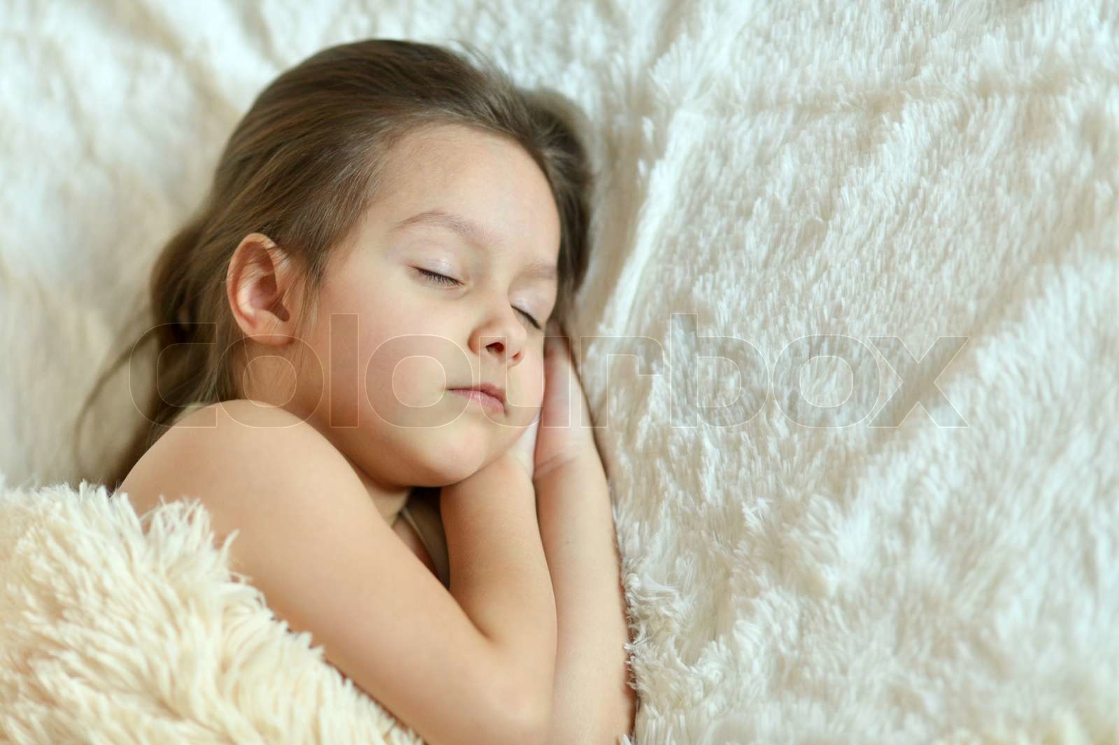 Beautiful little girl is sleeping | Stock image | Colourbox