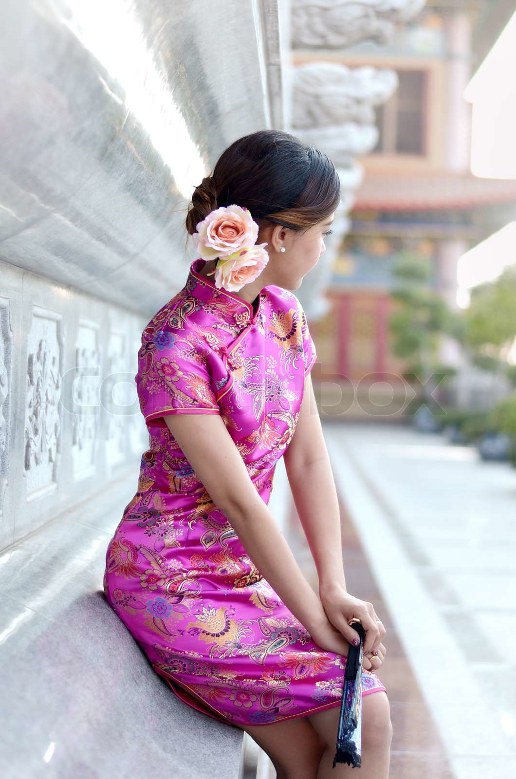 asian woman wearing a cheongsam | Stock image | Colourbox