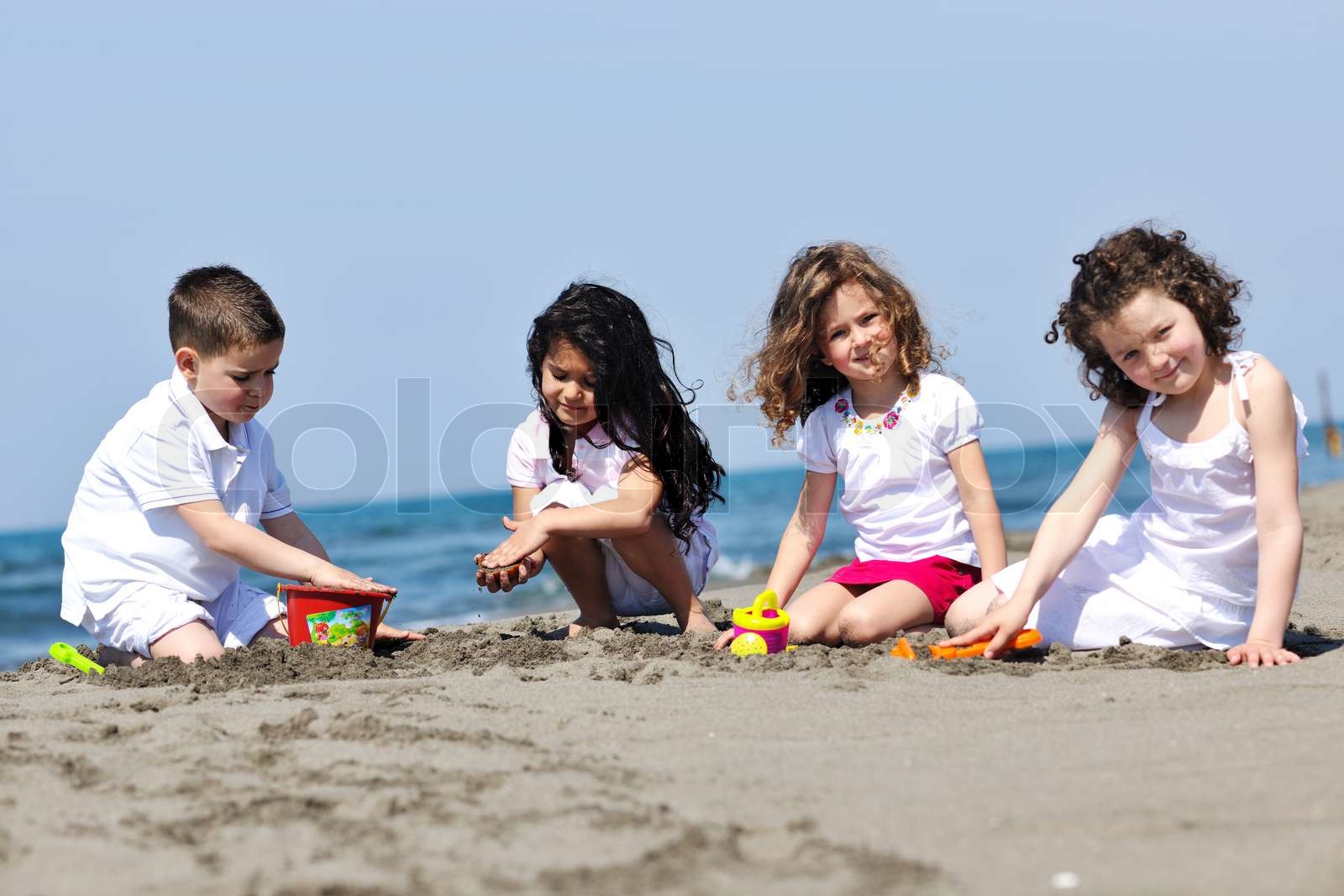 kids playing on beach | Stock image | Colourbox