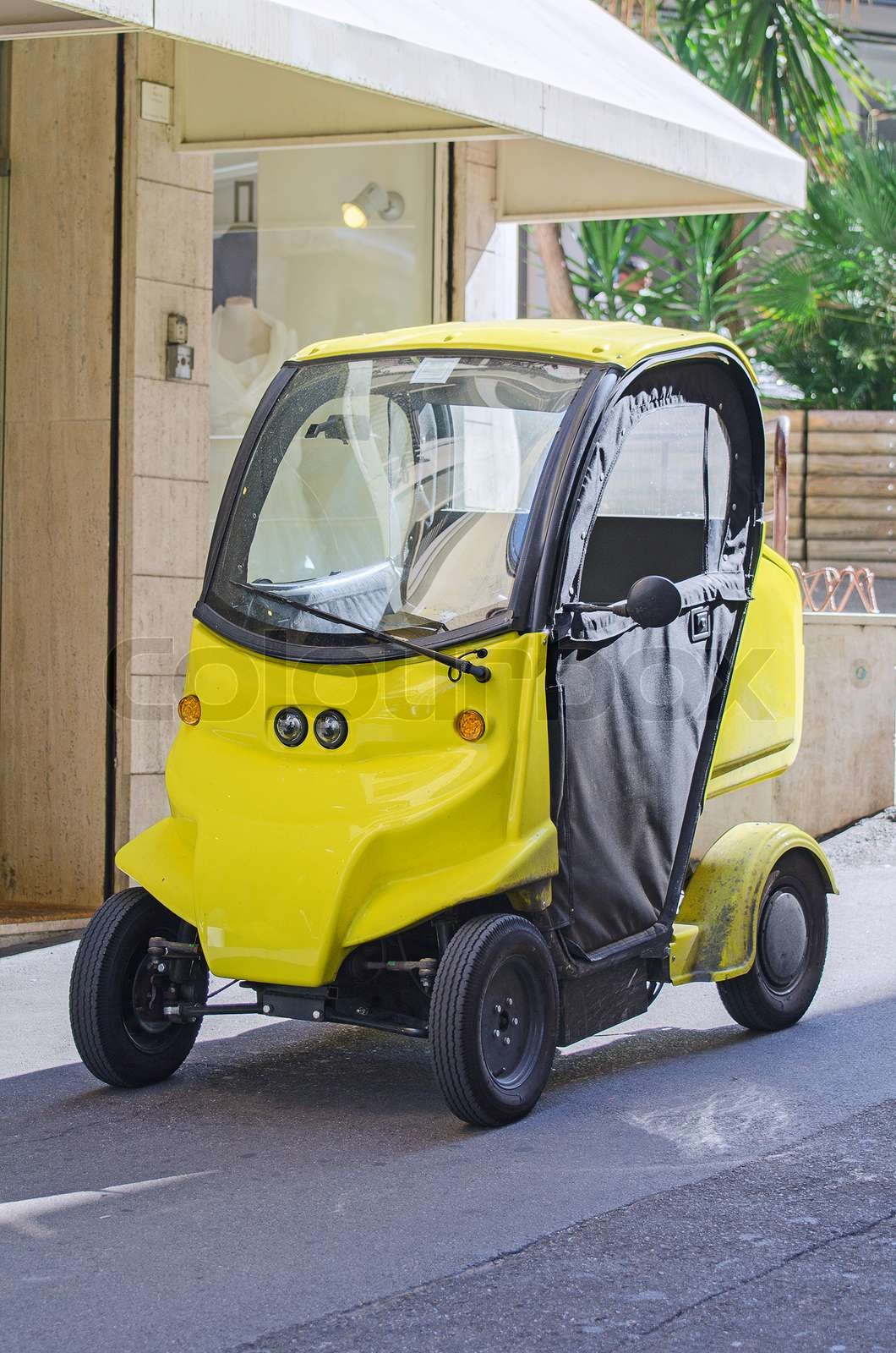 Small postal electric car. | Stock image | Colourbox