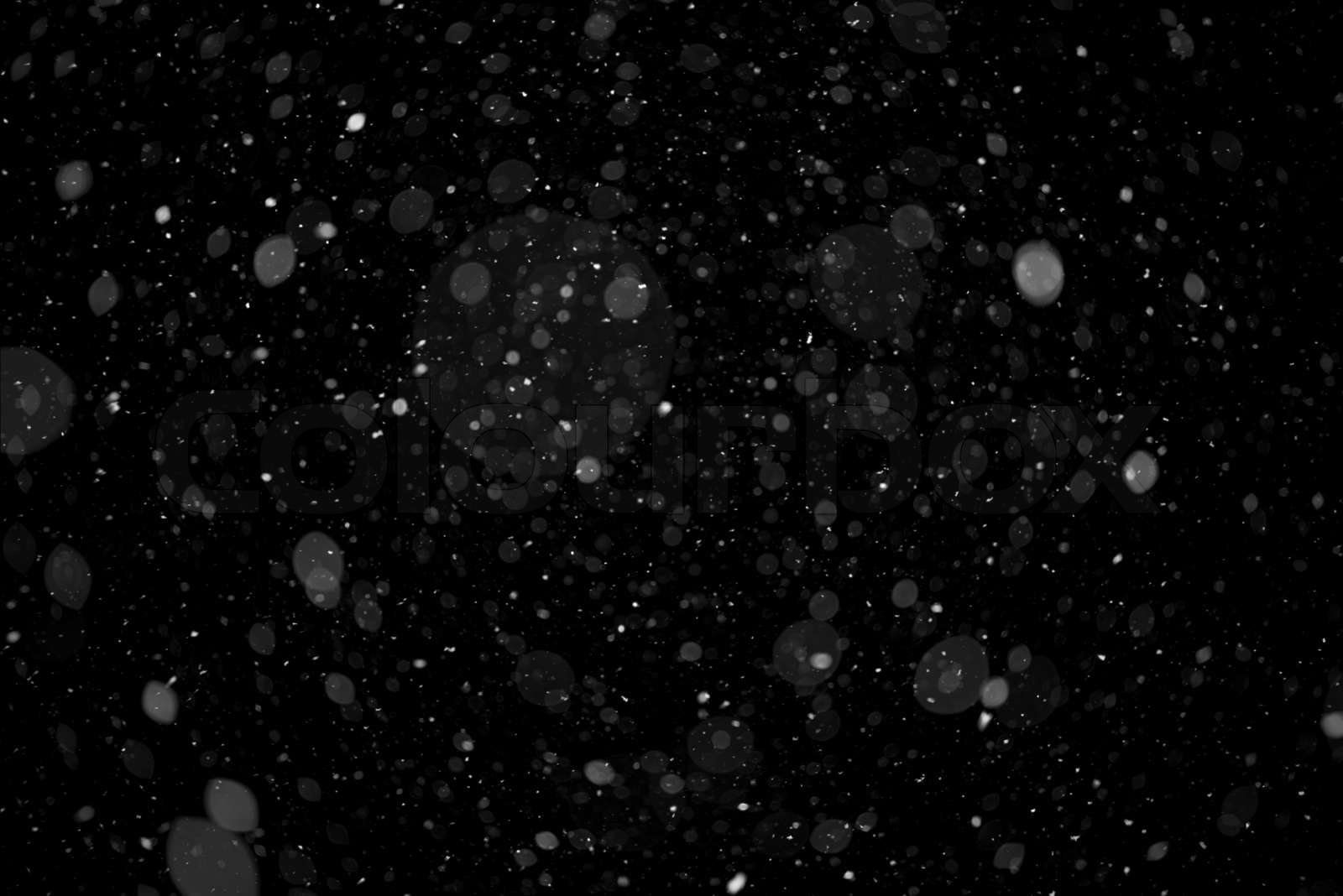 Falling Snow Isolated on Black | Stock image | Colourbox
