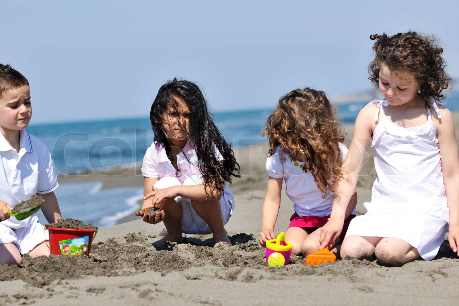 kids playing on beach | Stock image | Colourbox